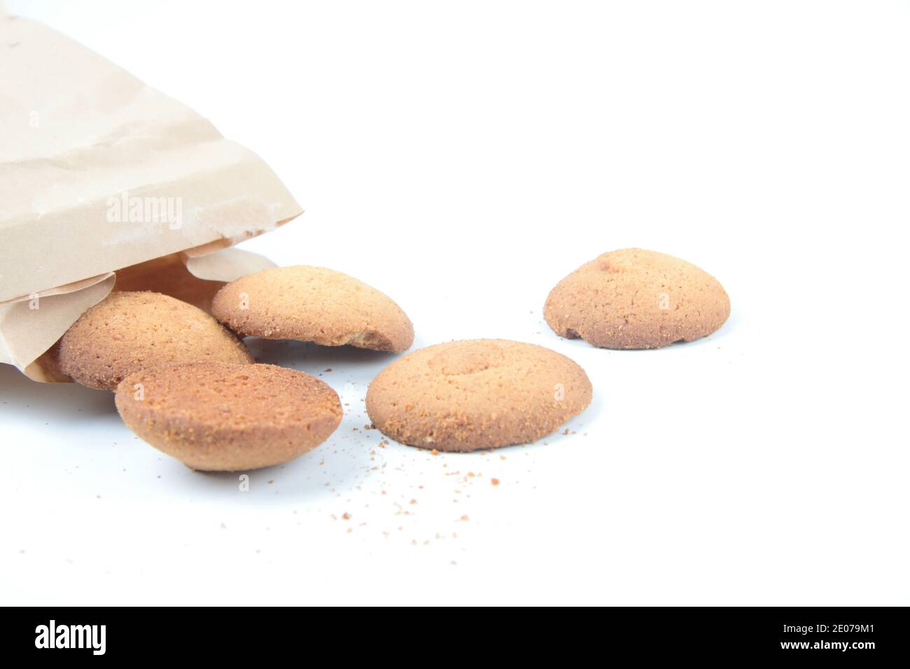 oatmeal cookies and brown kraft paper bag on white background. Image ...