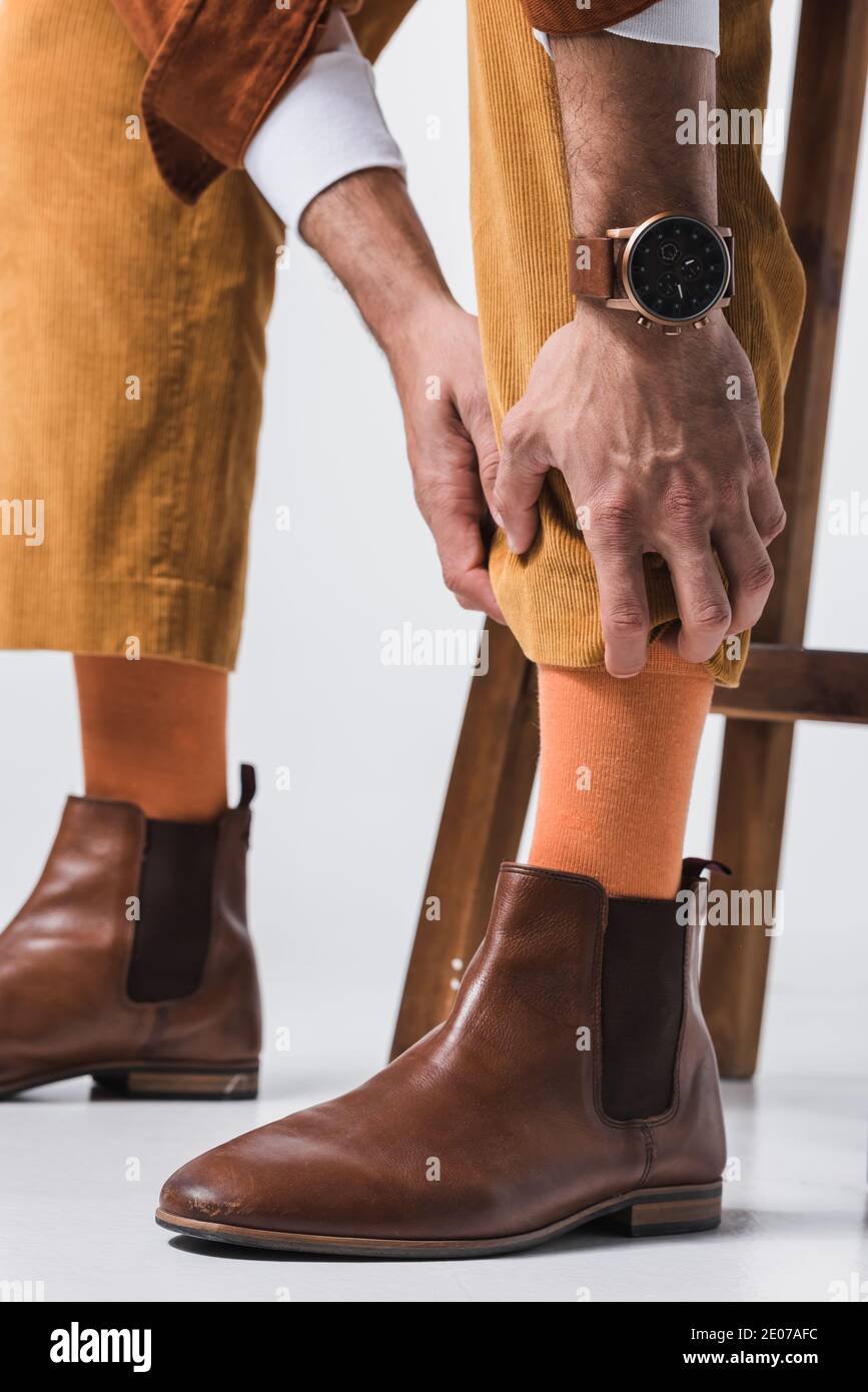 Adjusting pants hi-res stock photography and images - Alamy