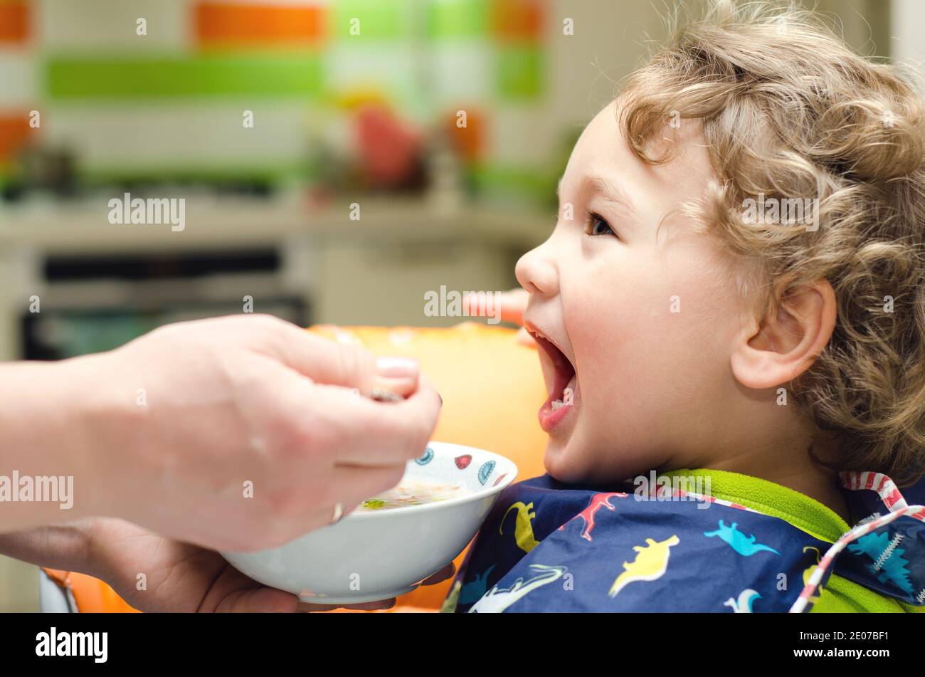 little child eating at home Stock Photo - Alamy