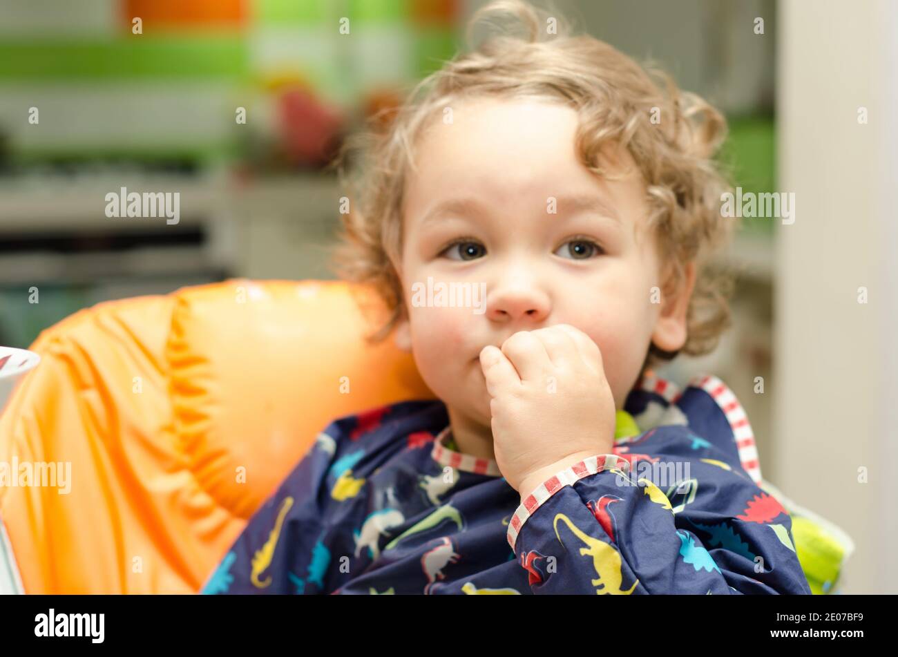 little child eating at home Stock Photo - Alamy