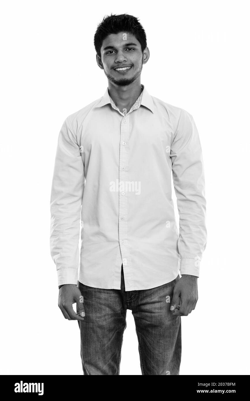 Indian man smiling standing Black and White Stock Photos & Images - Alamy