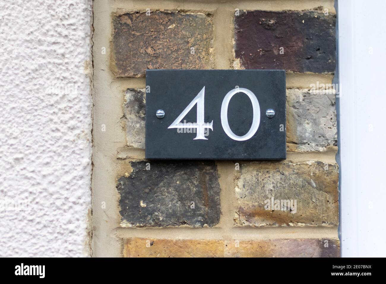House number 40 sign on wall hi-res stock photography and images - Alamy