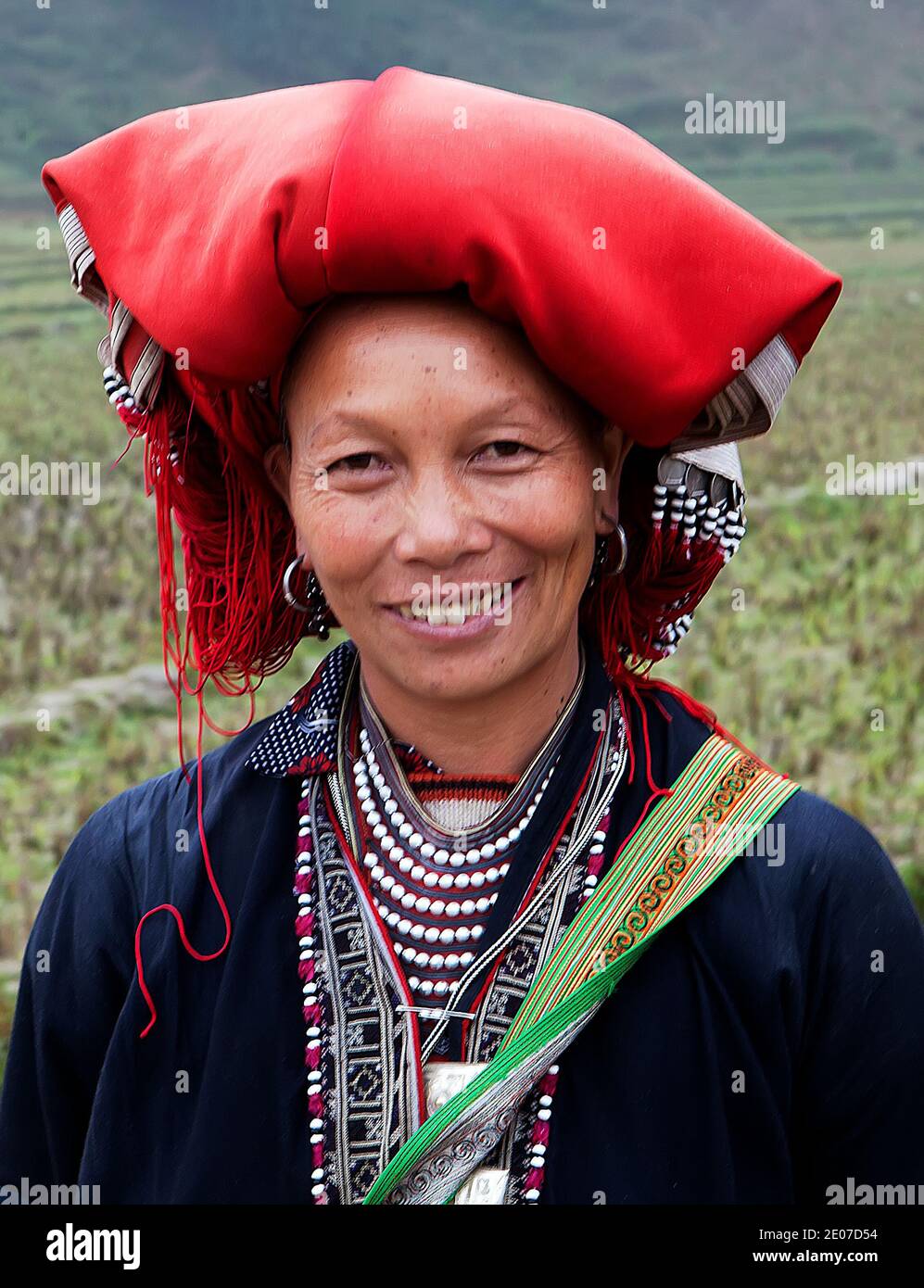 Close up portrait of a red Dao woman in Sa Pa Vietnam Stock Photo - Alamy