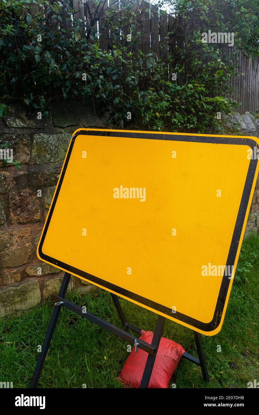 Blank Yellow Road advice sign with copy space Stock Photo - Alamy
