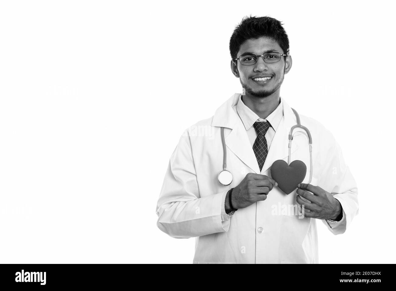 Holding to chest Black and White Stock Photos & Images - Alamy