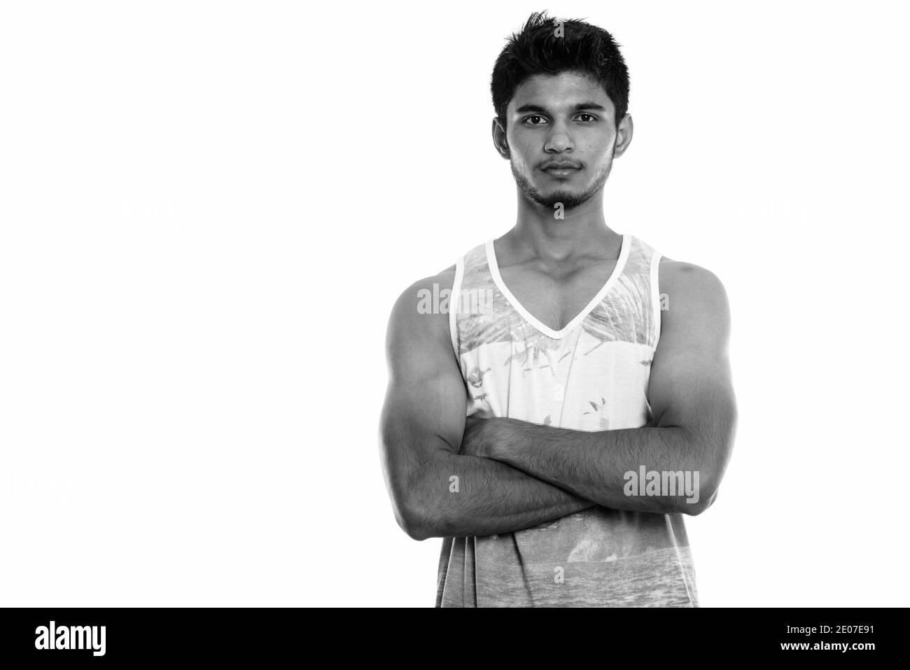 Indian man arms crossed Black and White Stock Photos & Images - Alamy