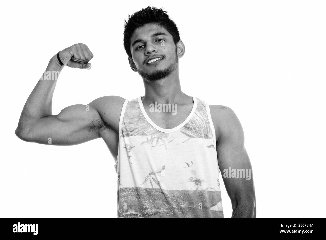 Man flexing biceps arm Black and White Stock Photos & Images - Alamy