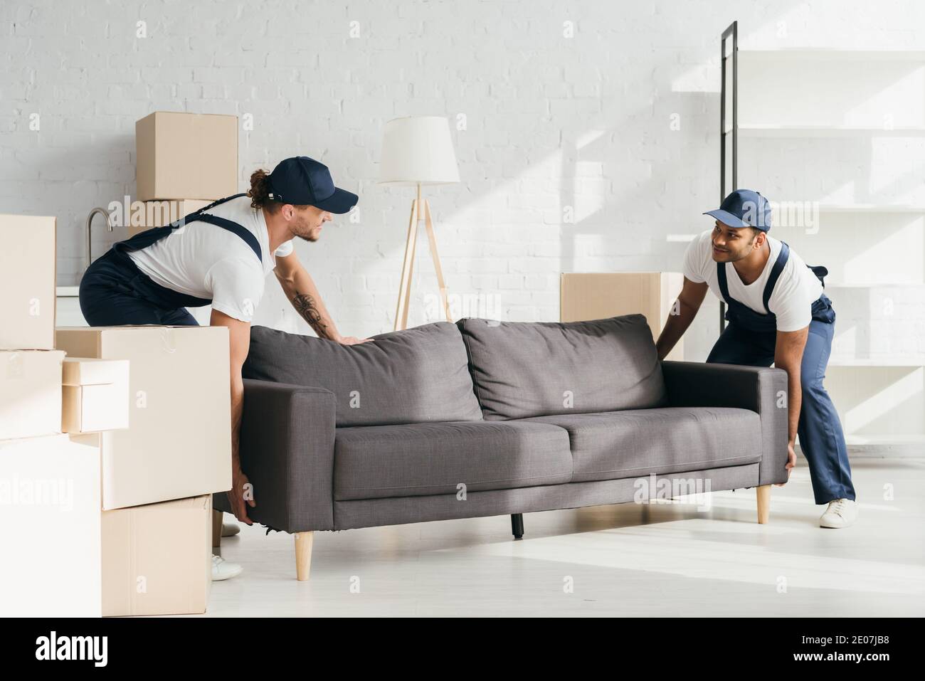Professional movers couch hi-res stock photography and images - Alamy