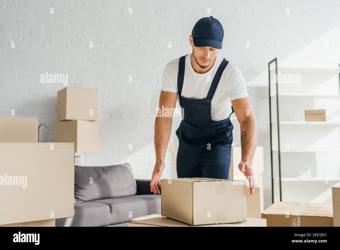 Man reaching in box hi-res stock photography and images - Alamy
