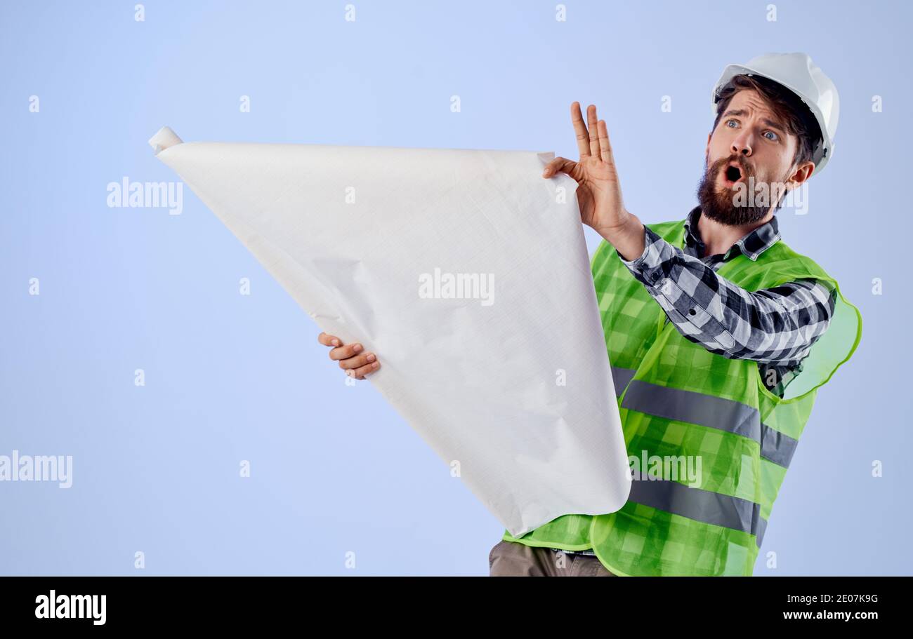 man in construction uniform blueprints professional engineer work blue ...