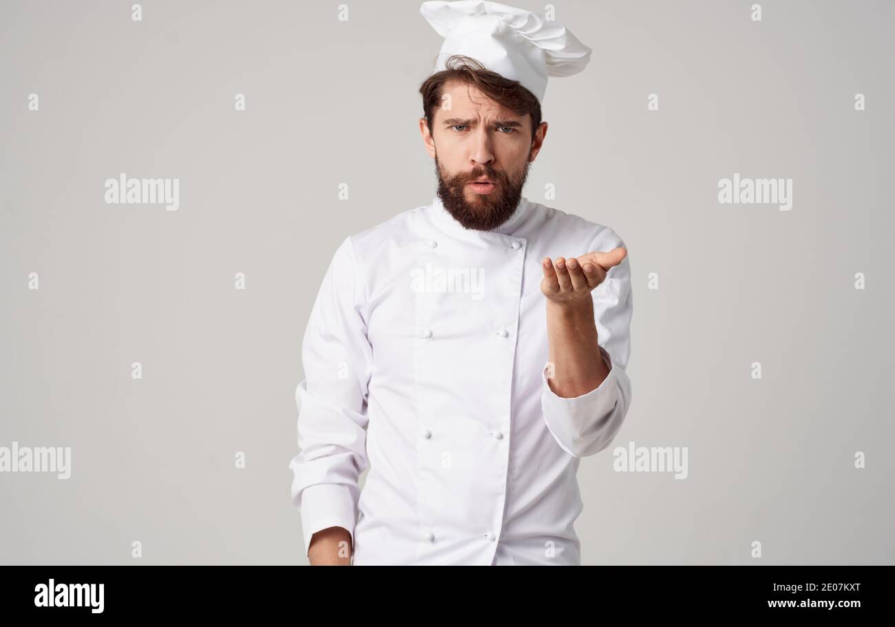 male chef uniform headdress light background cropped view Stock Photo ...