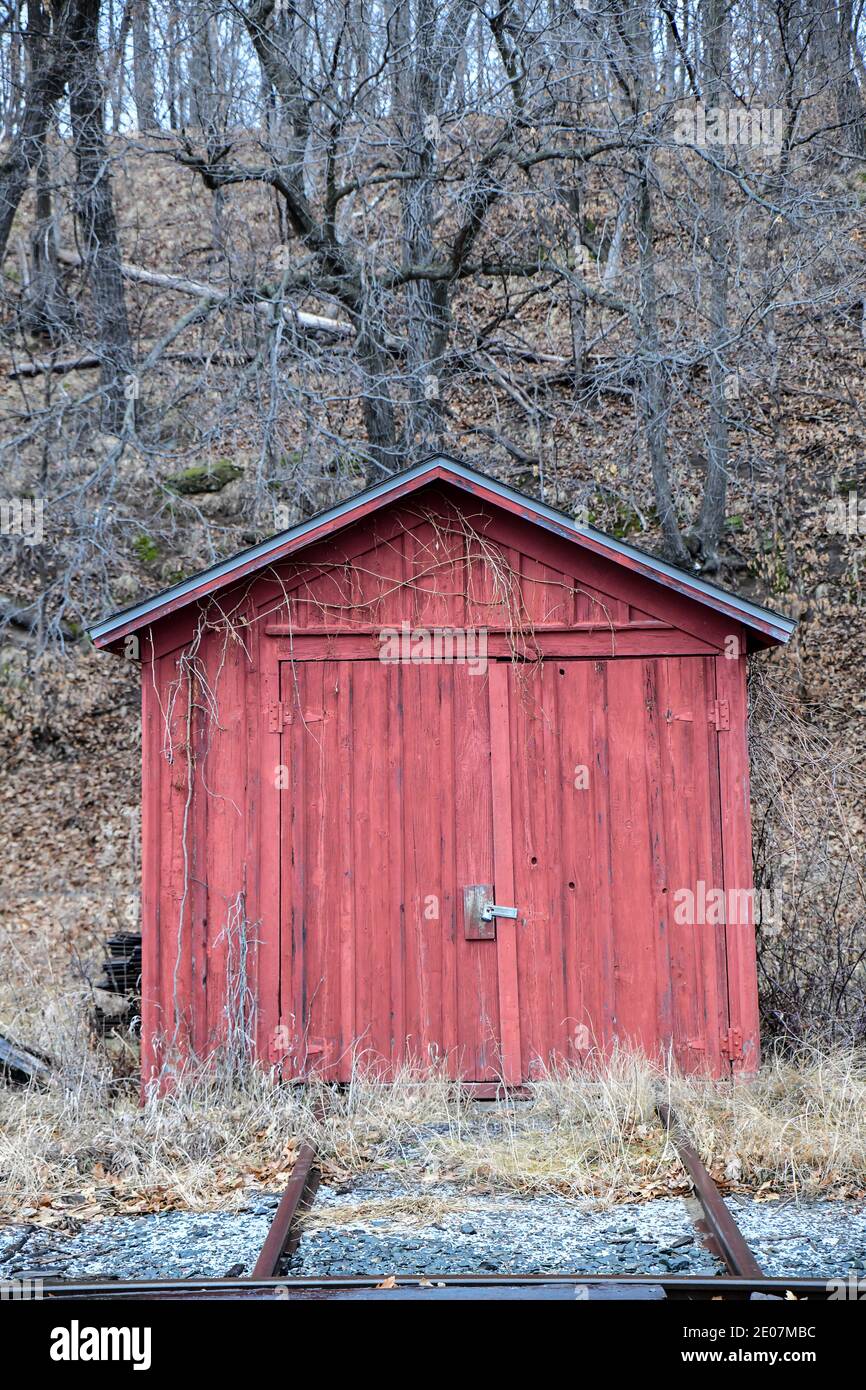 weathered wooden old farm agricultural barn in the winter farmland ...
