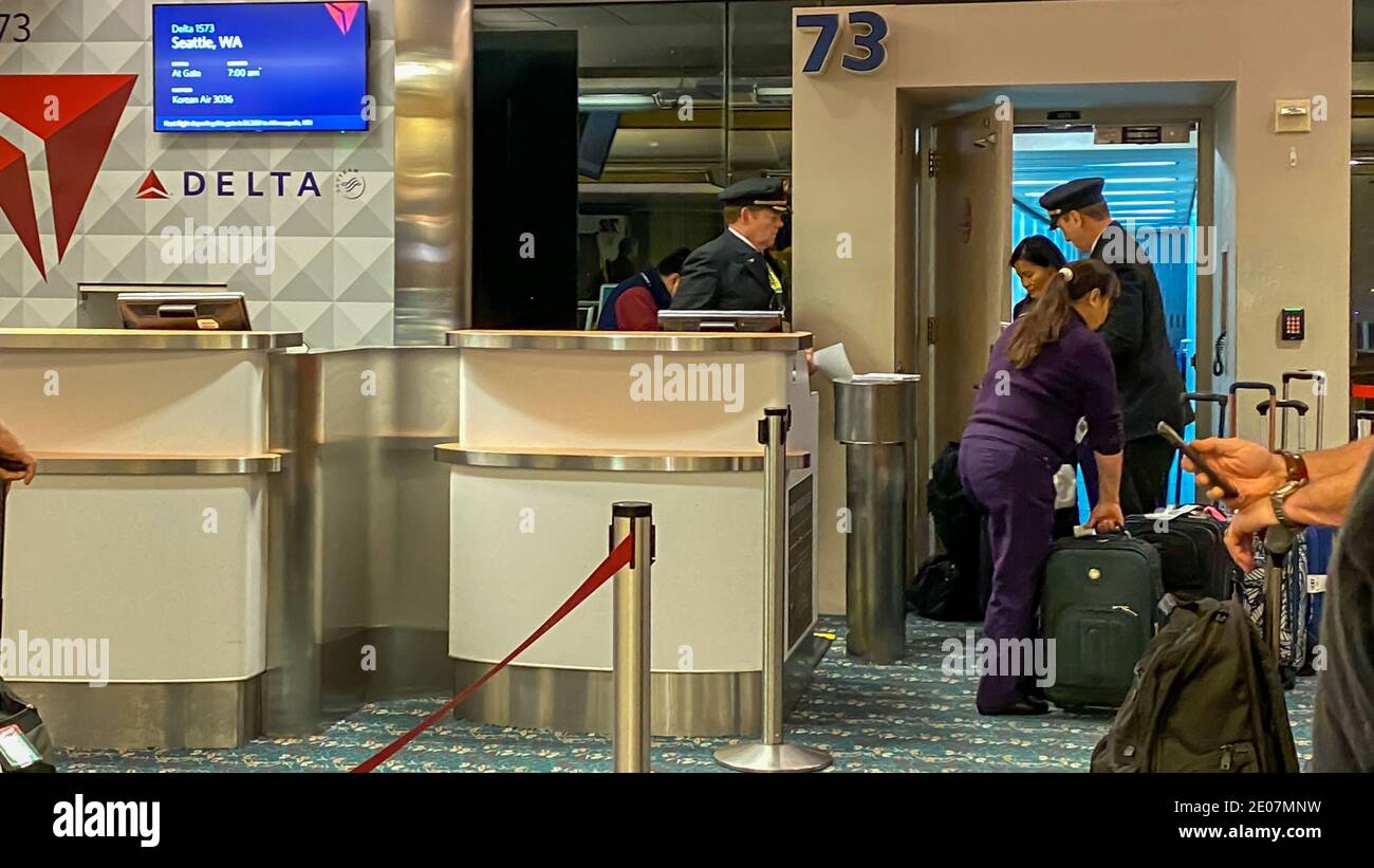 Orlando, FL USA - February 19, 2020: Pilots in a Delta gate preparing ...