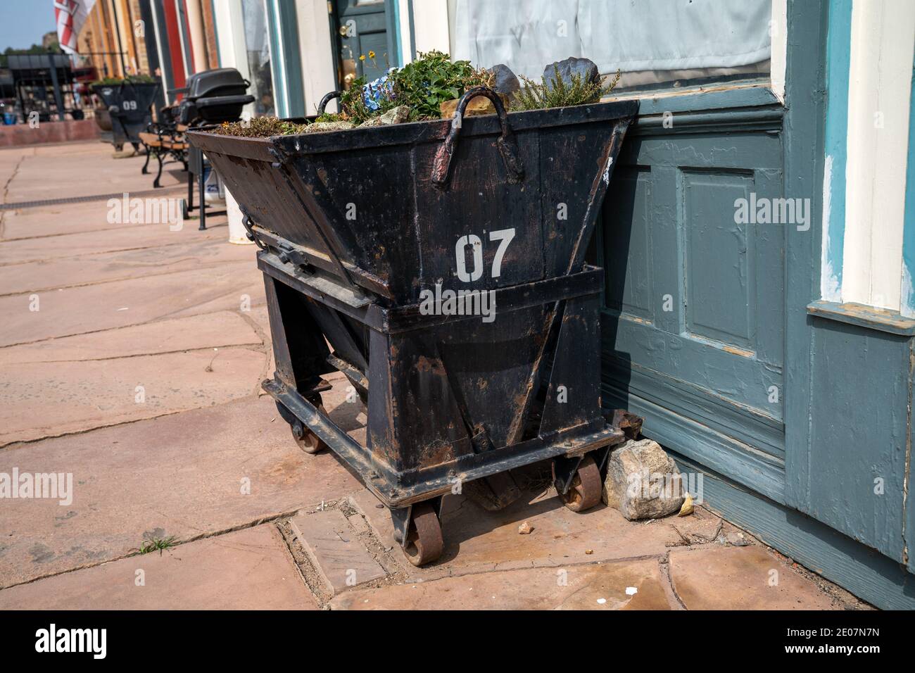 Old mining ore carts used as decorative planters in the gold mining ...