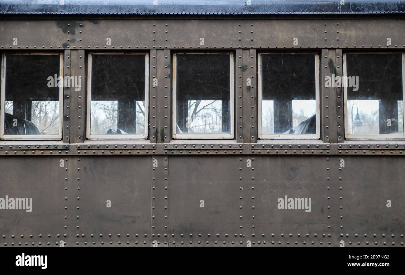 Vintage and abandoned empty railroad train car on the train tracks ...