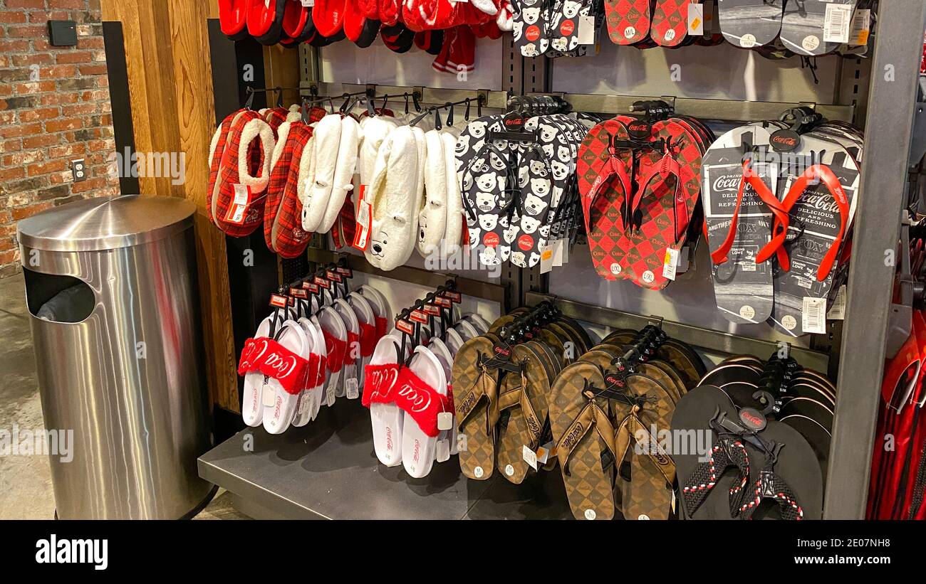 Orlando, FL USA - February 15, 2020: Sandals and slippers with the Coca ...