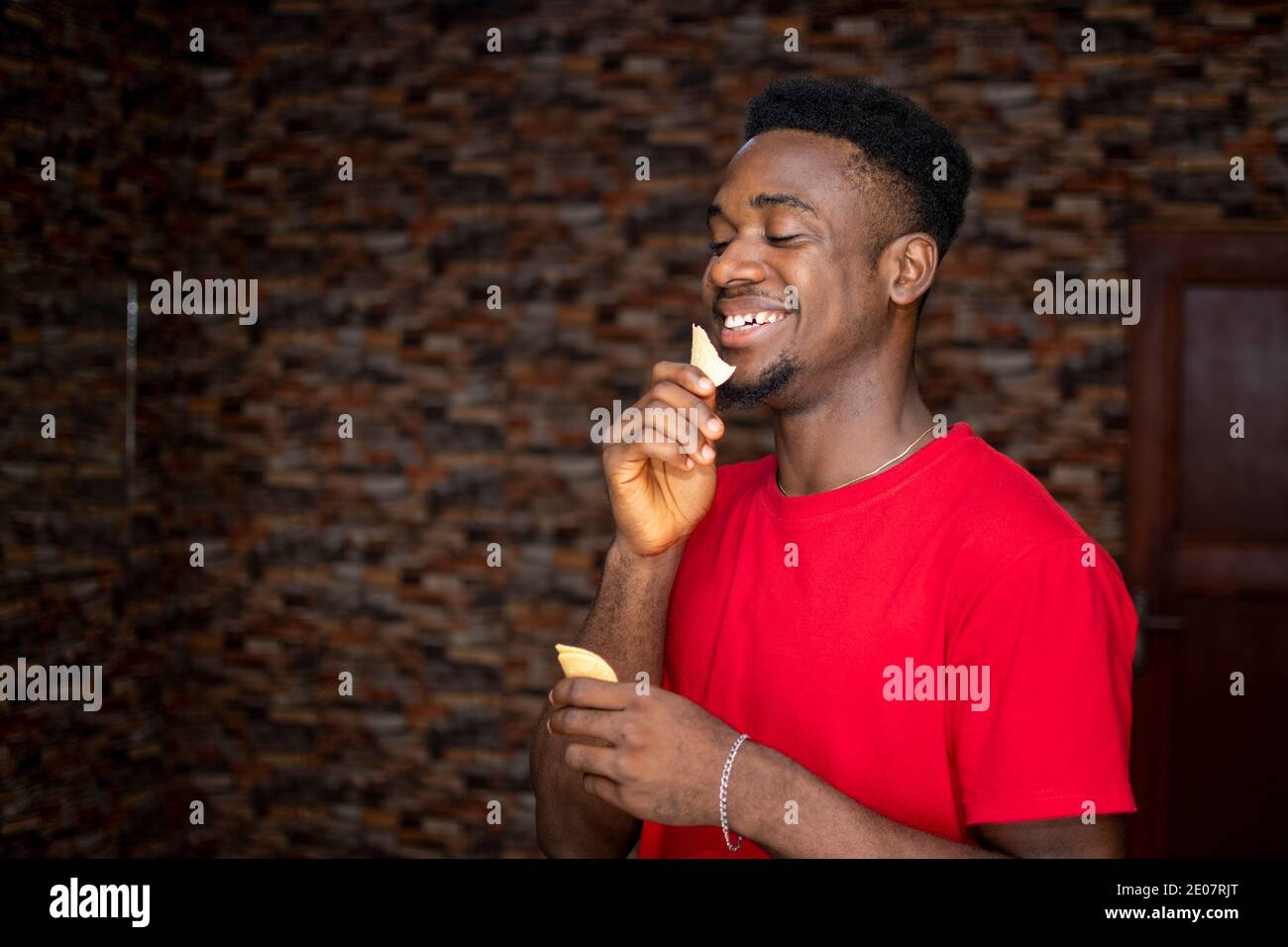 Man Eating Snack Light High Resolution Stock Photography and Images - Alamy