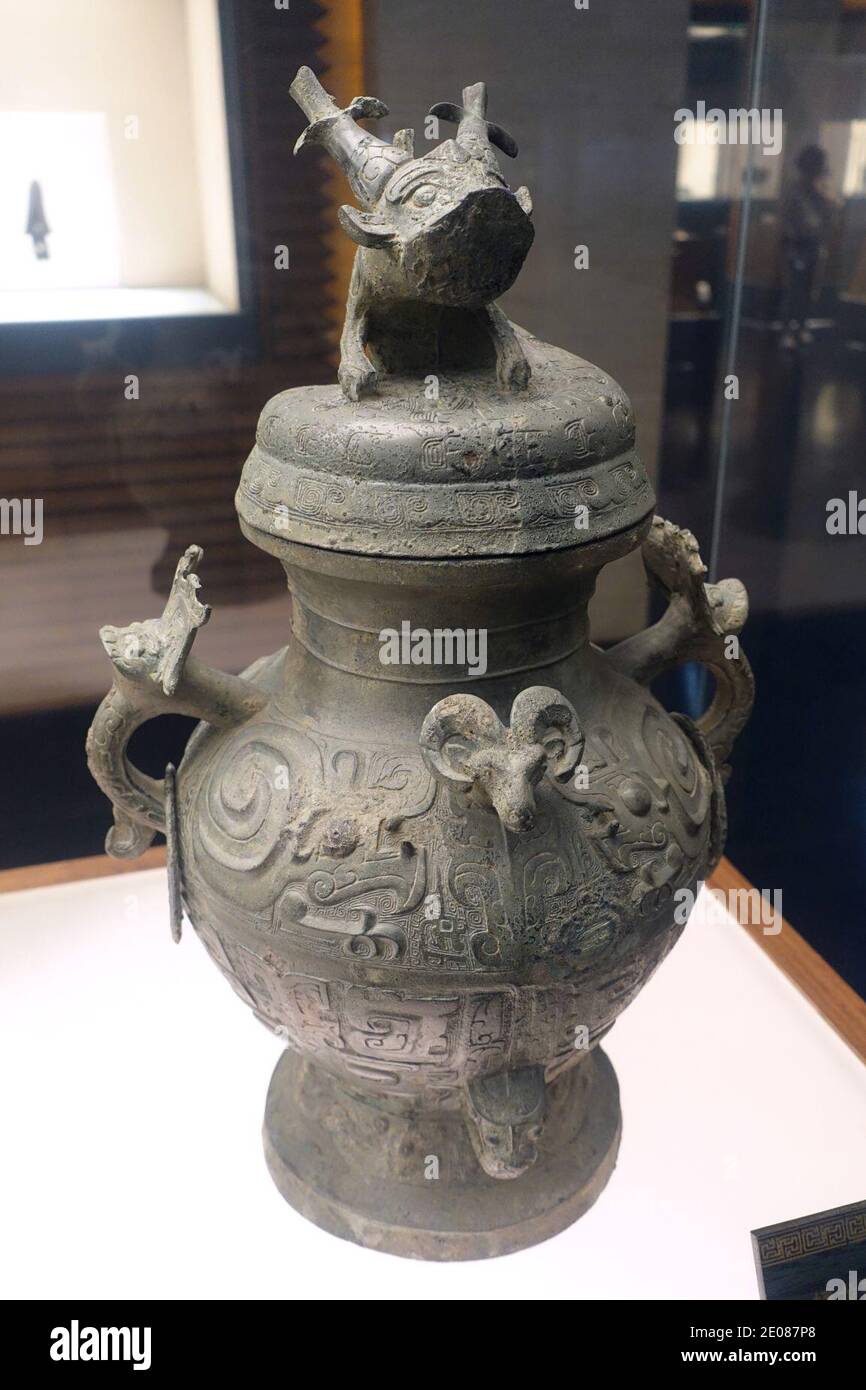 Lei (wine vessel) with coiling-dragon lid, China, unearthed at Zhuwajie ...