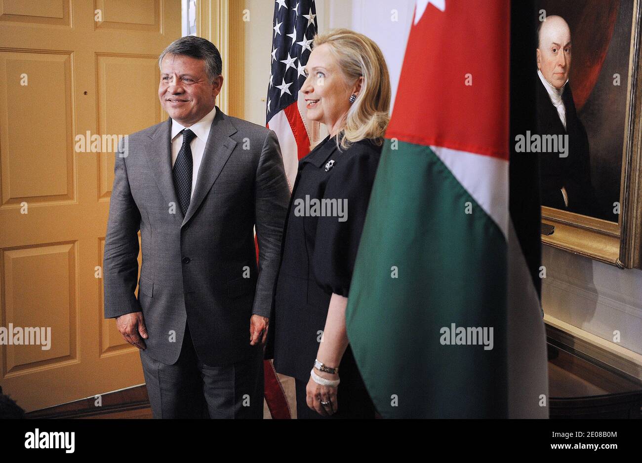 US Secretary of State Hillary Clinton and King Abdullah of Jordan pose ...