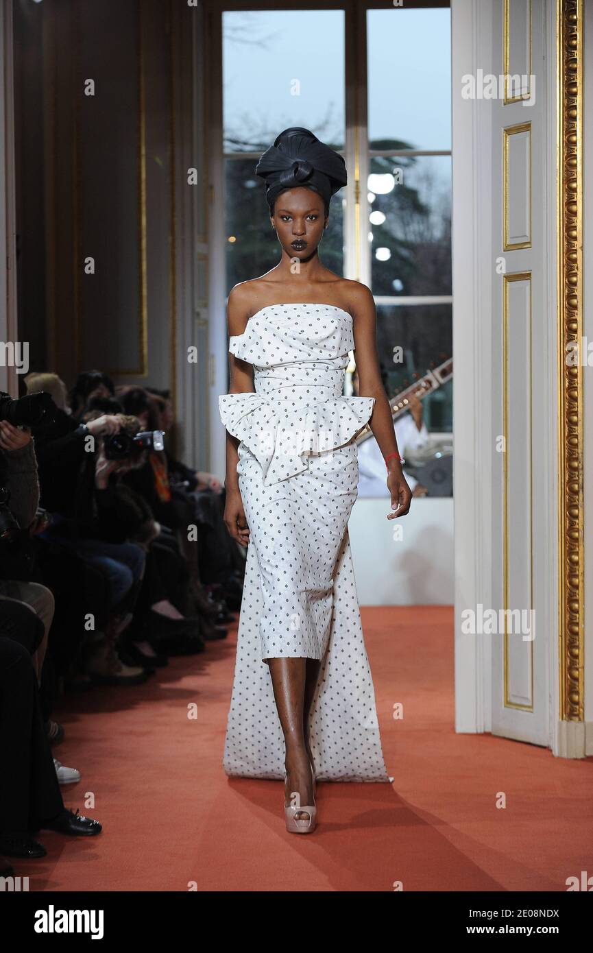 A model displays a creation by Designer Didit Hediprasetyo for his ...