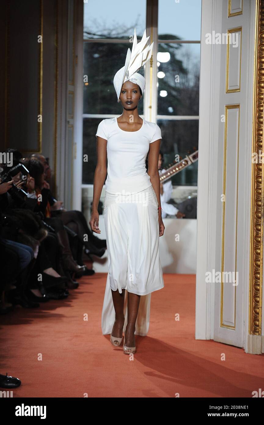 A model displays a creation by Designer Didit Hediprasetyo for his ...