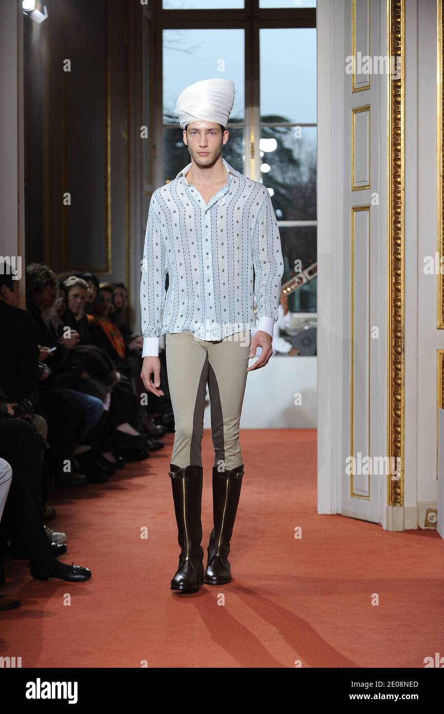 A model displays a creation by Designer Didit Hediprasetyo for his ...