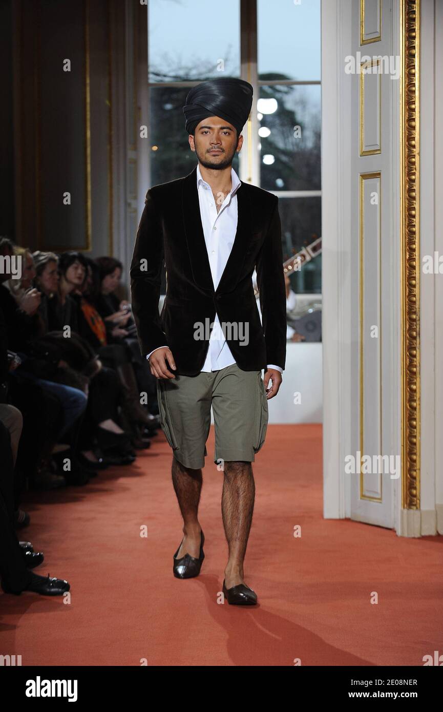 A model displays a creation by Designer Didit Hediprasetyo for his ...