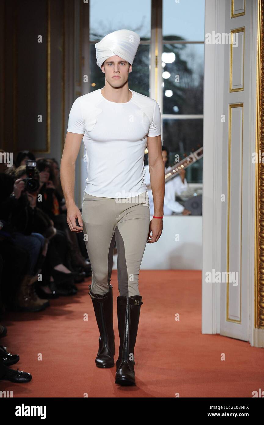 A model displays a creation by Designer Didit Hediprasetyo for his ...