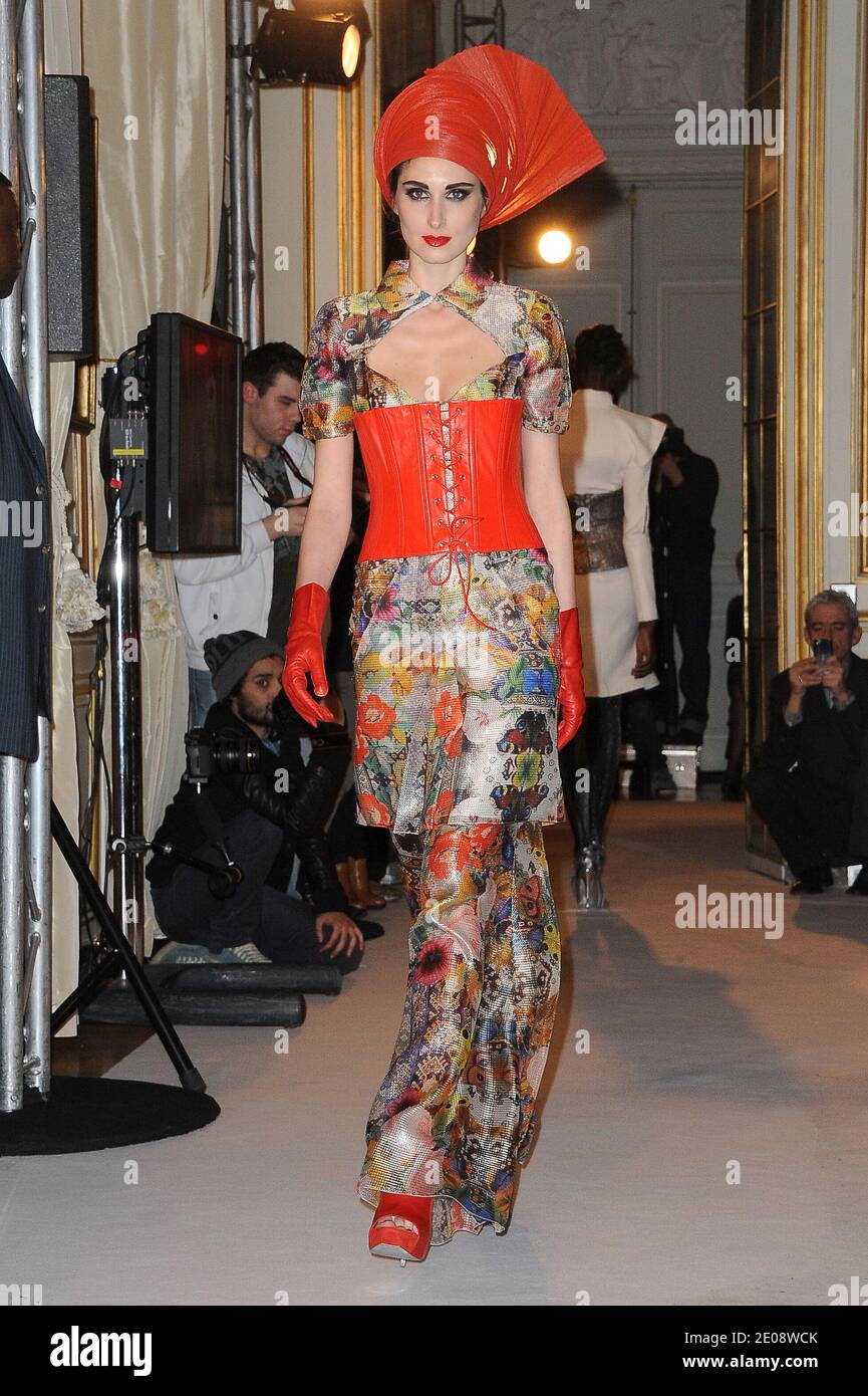 A model displays a creation by Swiss designer Jean-Luc Amsler for his ...