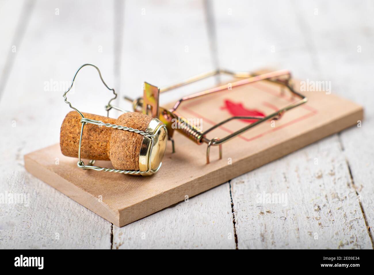 A mousetrap and a champagne cork. Too much alcohol on New Year's Eve is ...