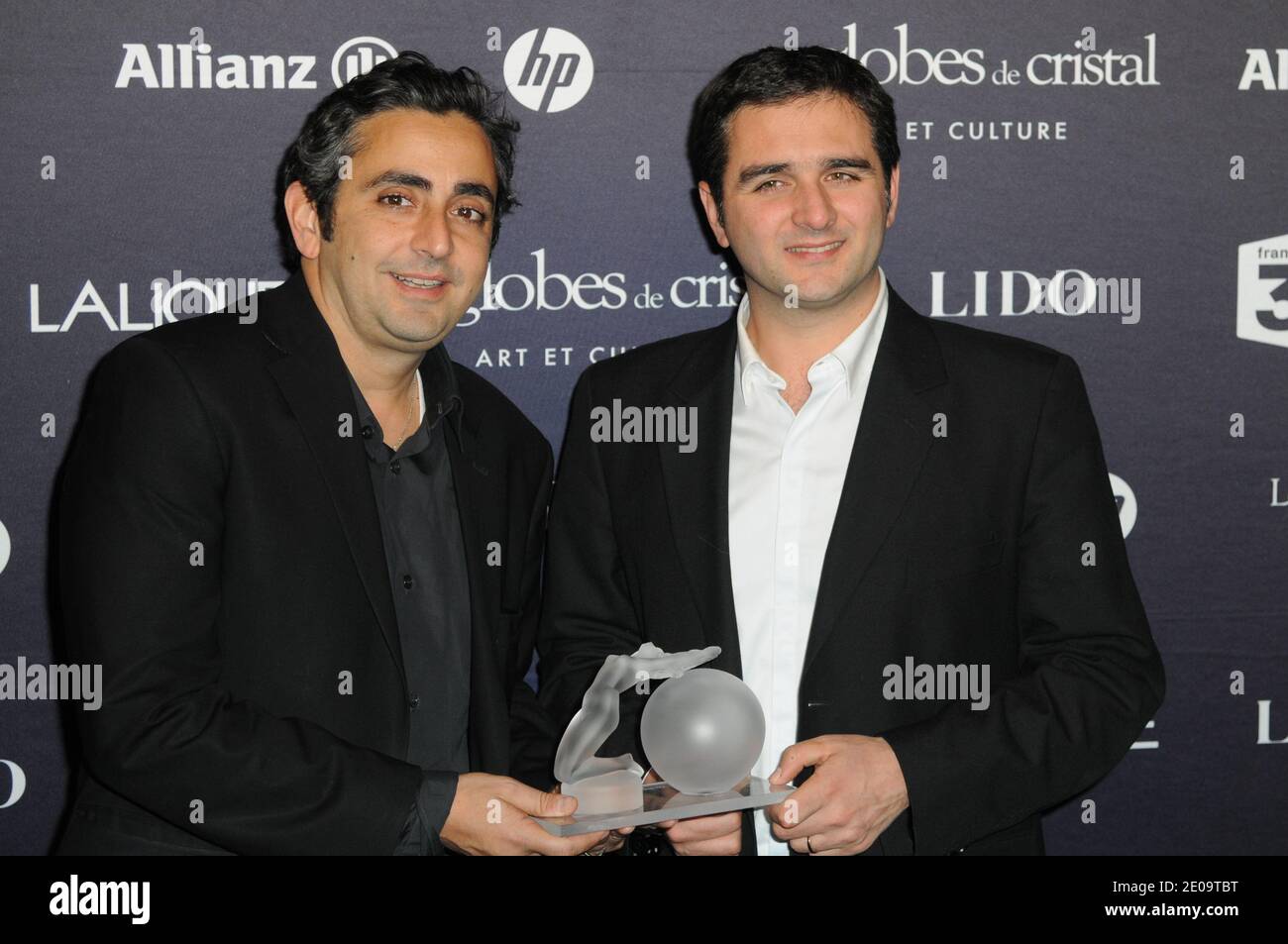 Eric Toledano and Olivier Nakache posing in the press room at the 7th ...