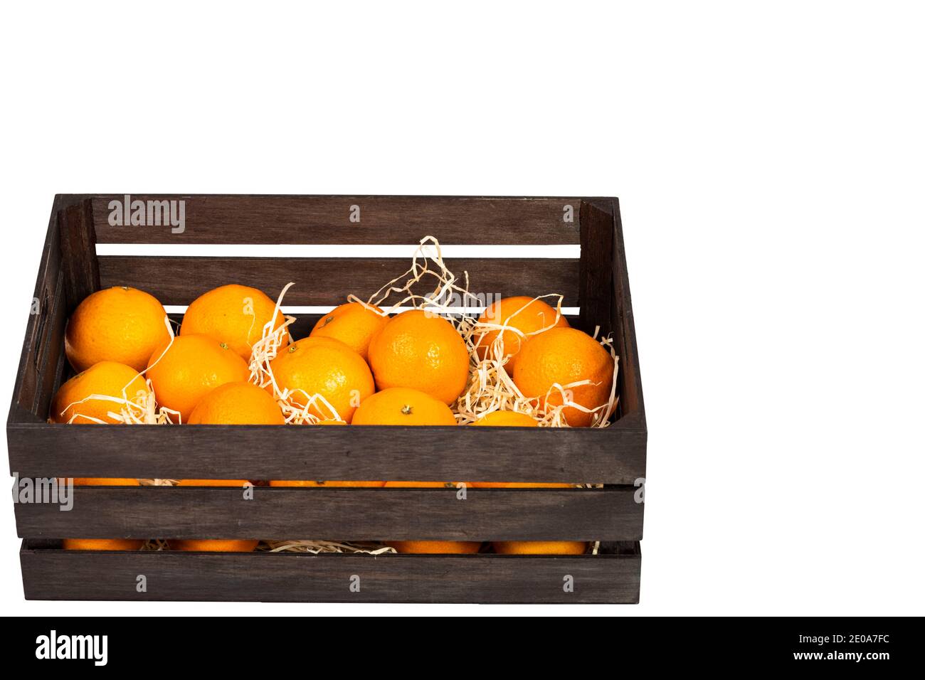 Close up view of wooden box of fresh mandarins isolated on white ...