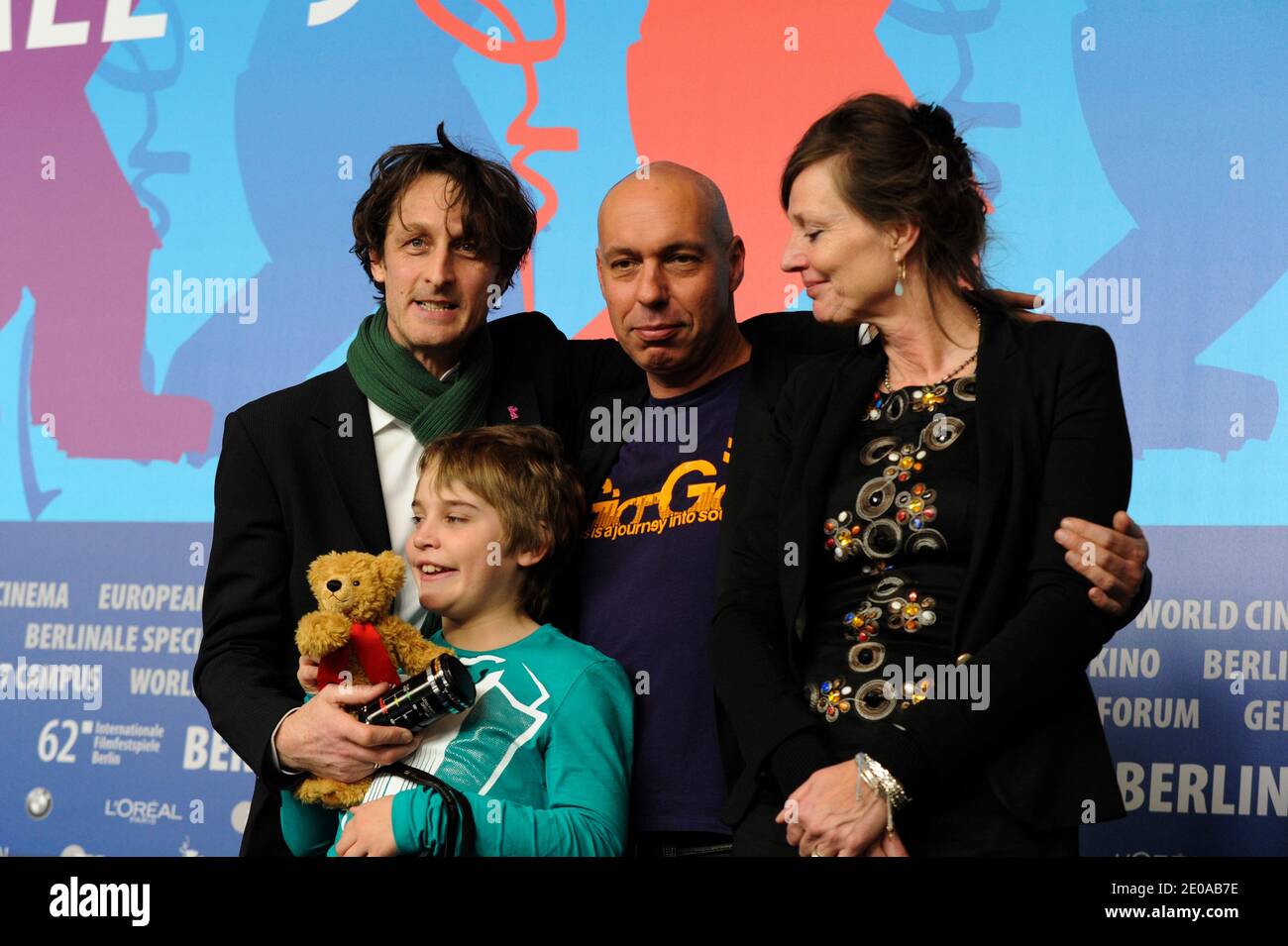 Young Dutch actor Rick Lens (front C) holds his teddy bear while posing ...