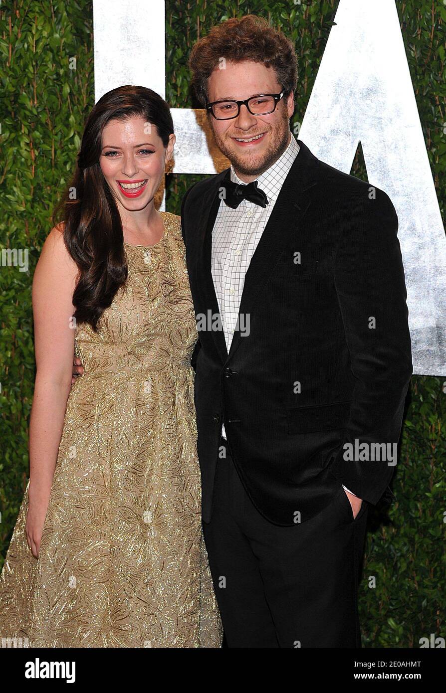 Lauren Miller and Seth Rogan arriving at the 2012 Vanity Fair Oscar ...