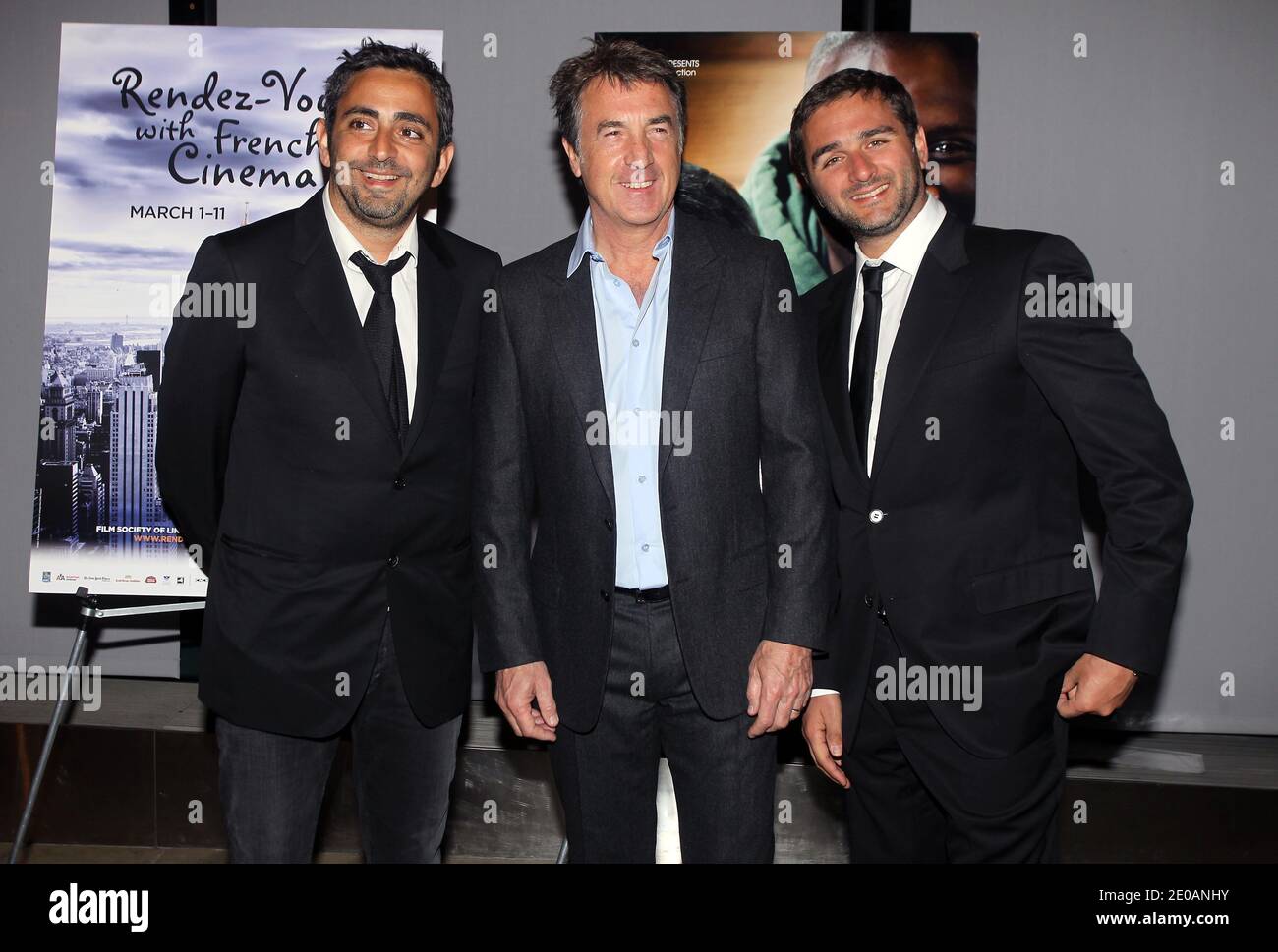 Actor Francois Cluzet and directors Eric Toledano and Olivier Nakache ...