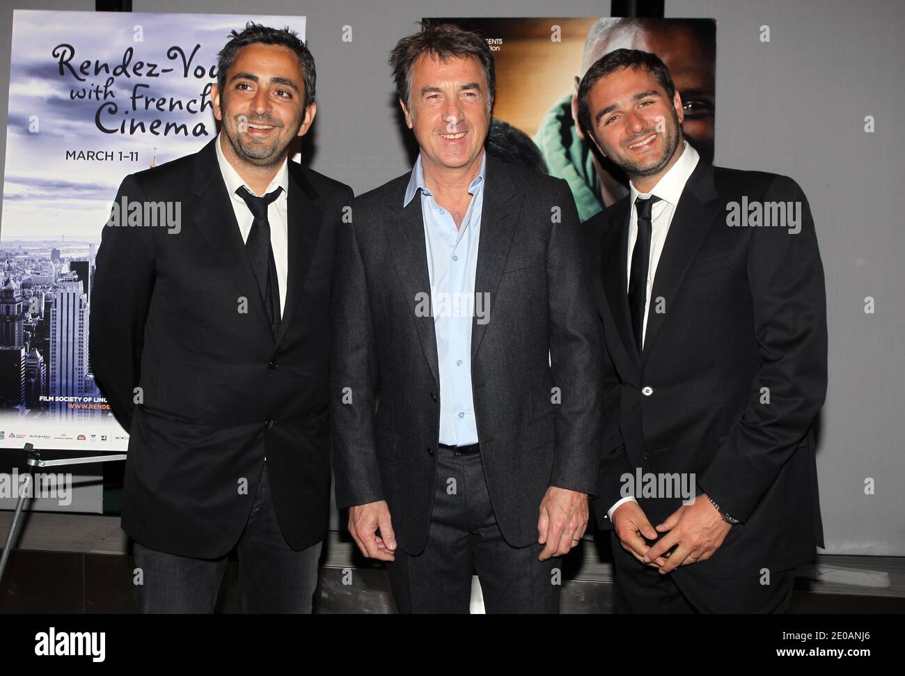 Actor Francois Cluzet and directors Eric Toledano and Olivier Nakache ...