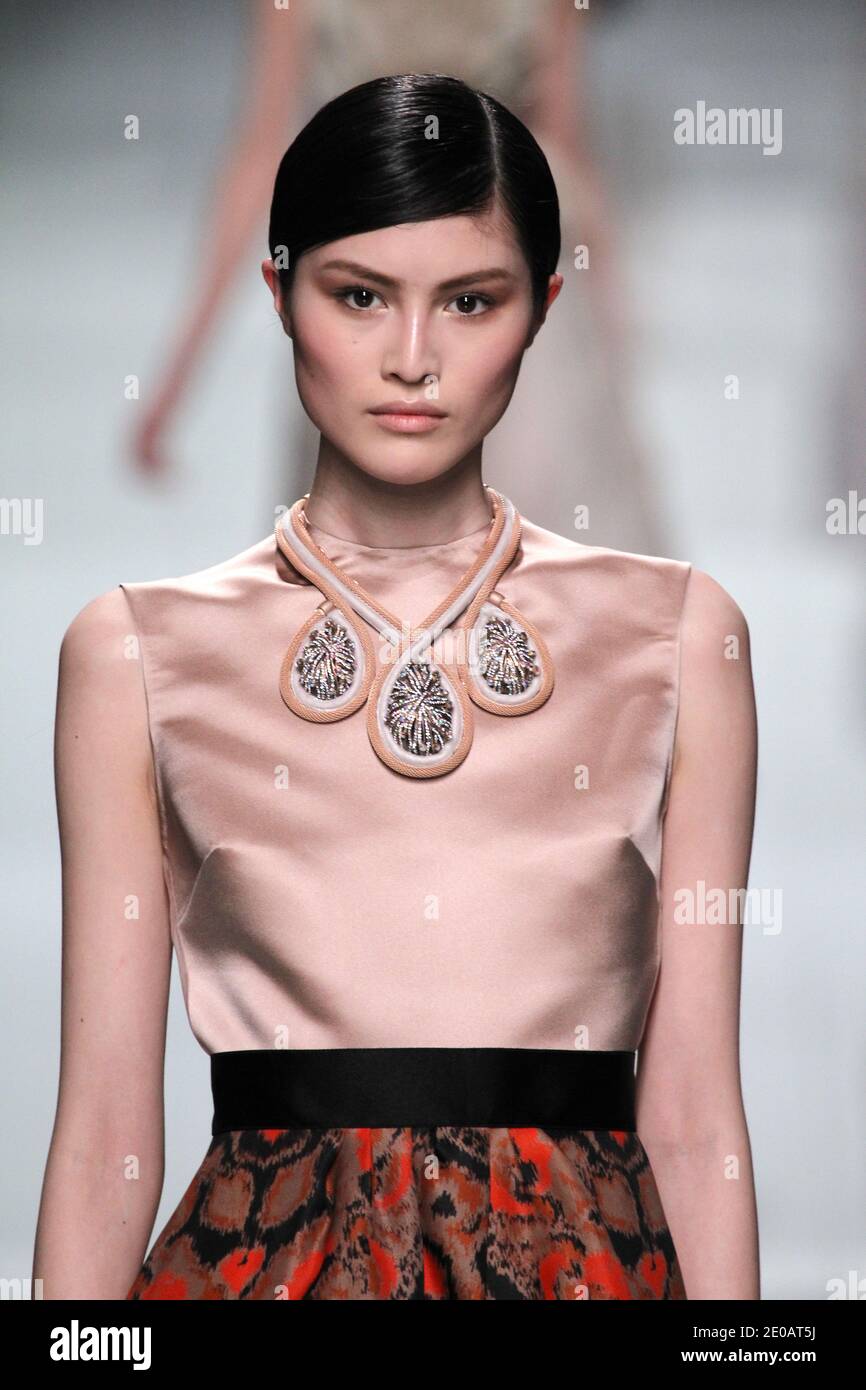 A model displays a creation by British designer Bill Gaytten for ...