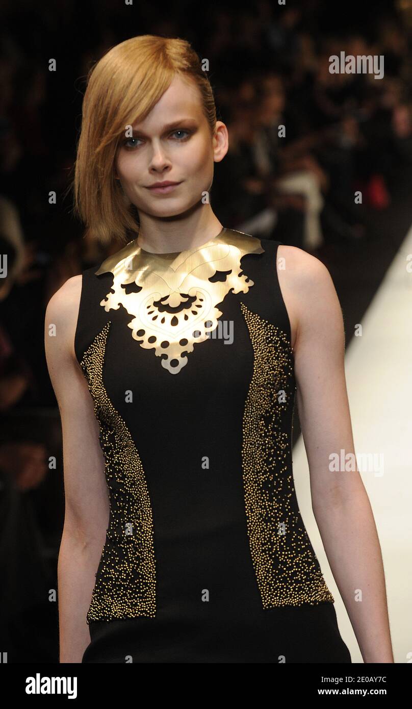 A model displays a creation by French fashion designer Maxime Simoens ...