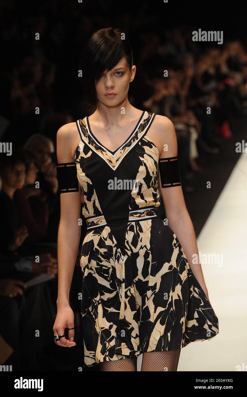 A model displays a creation by French fashion designer Maxime Simoens ...