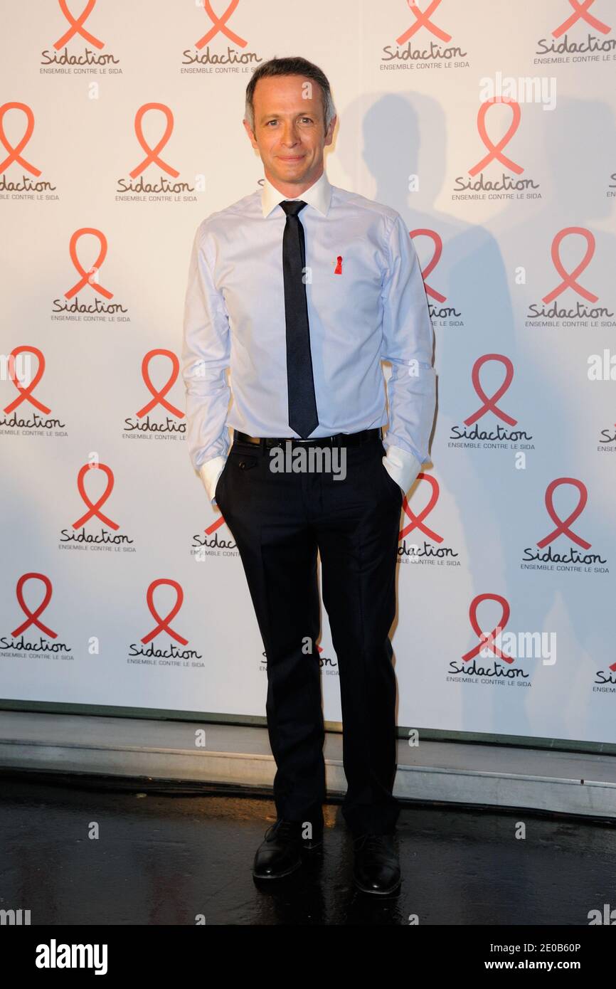 Samuel Etienne posing at a photocall for the launch party of the 2012 ...