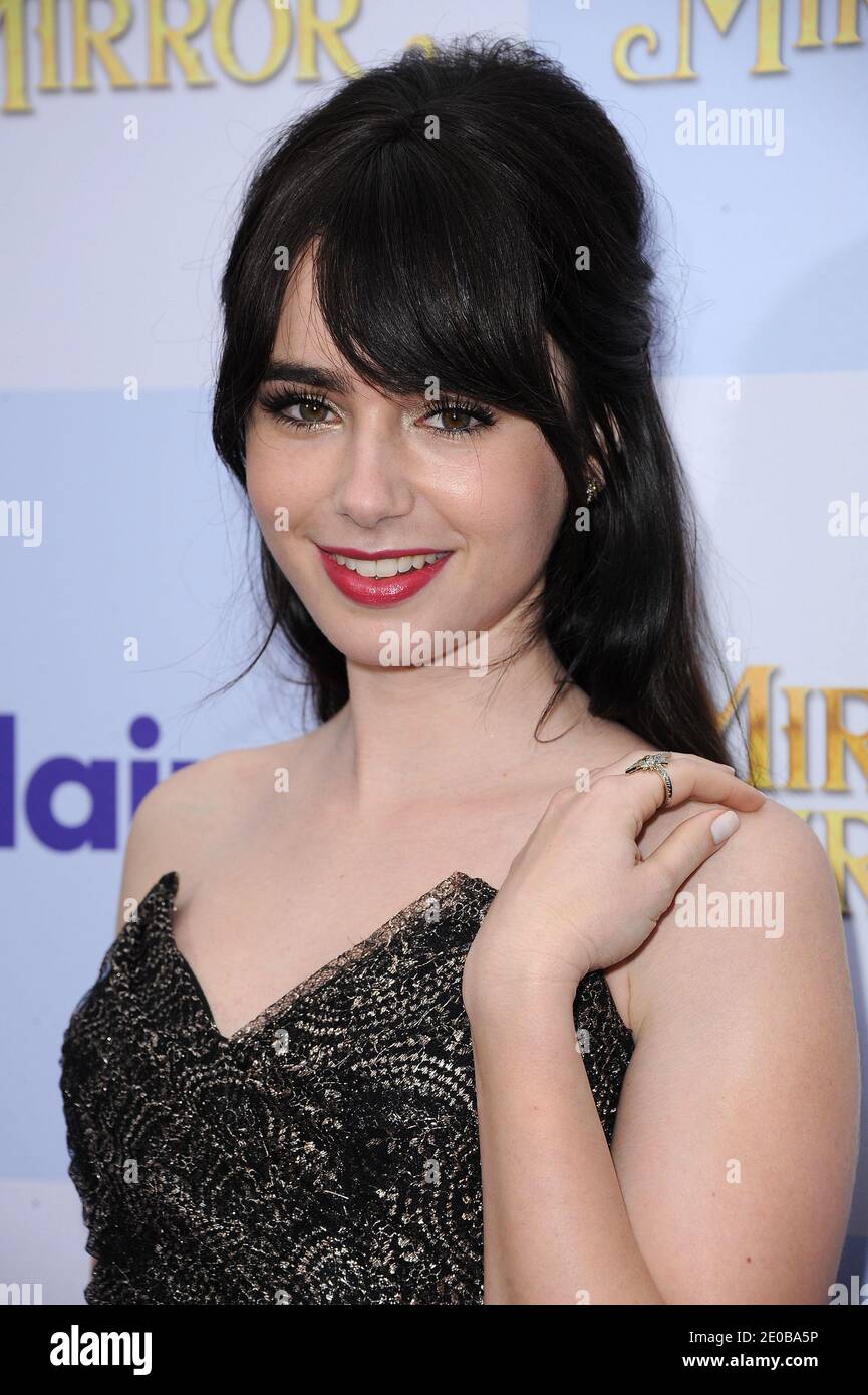 Lily Collins arrives at the Mirror Mirror Los Angeles premiere at ...