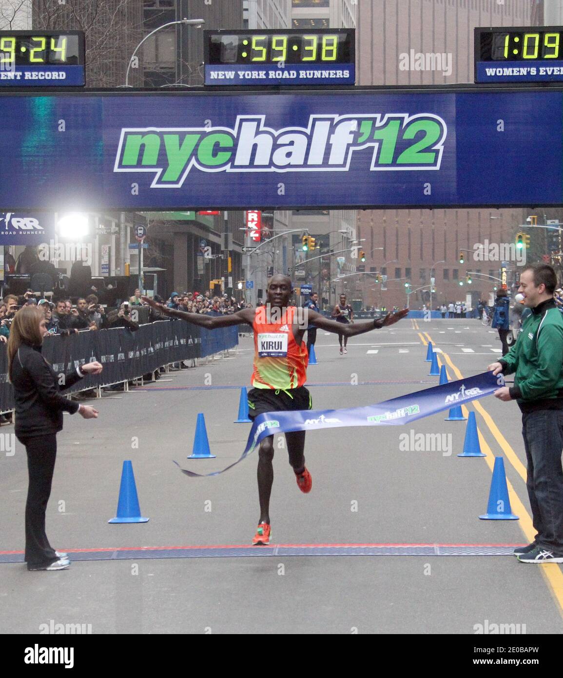 Peter Kirui of Kenya crosses the finish line and won the New York City ...