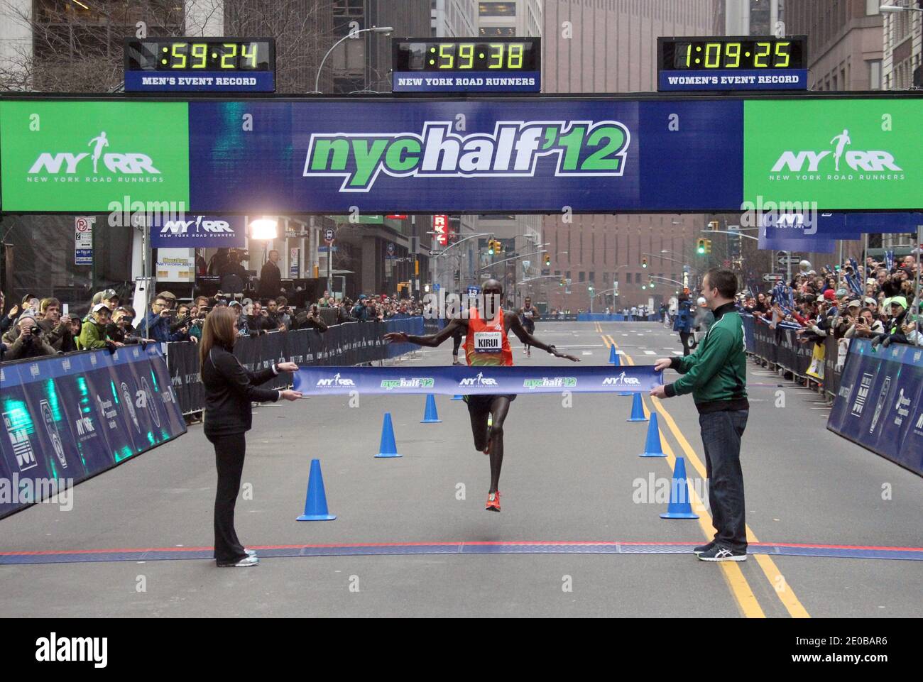 Peter Kirui of Kenya crosses the finish line and won the New York City ...