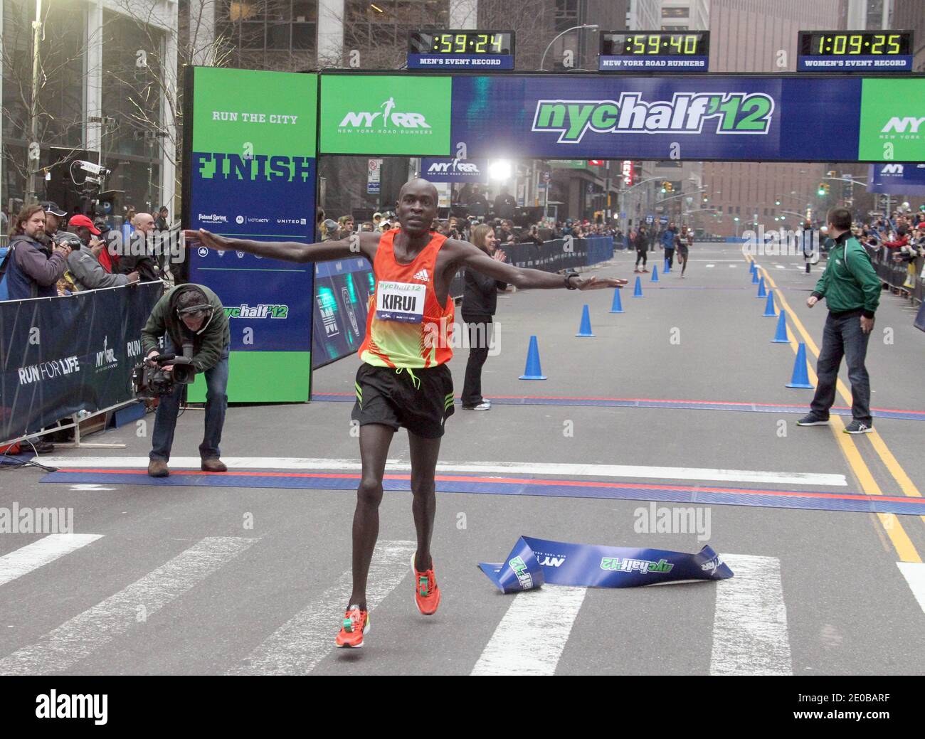 Peter Kirui of Kenya crosses the finish line and won the New York City ...