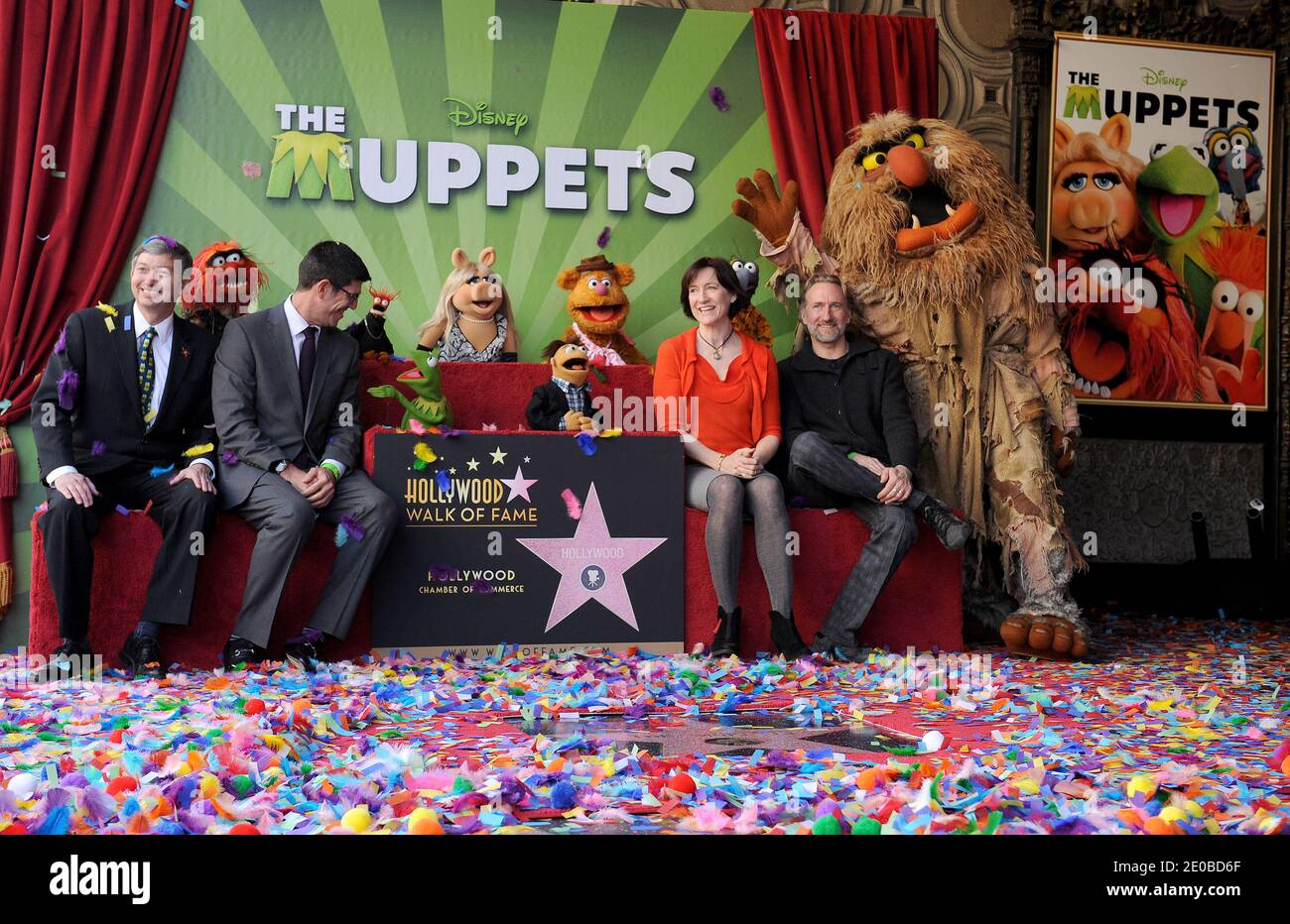 Leron Gubler, Rich Ross and Lisa Henson pose during the ceremony where ...