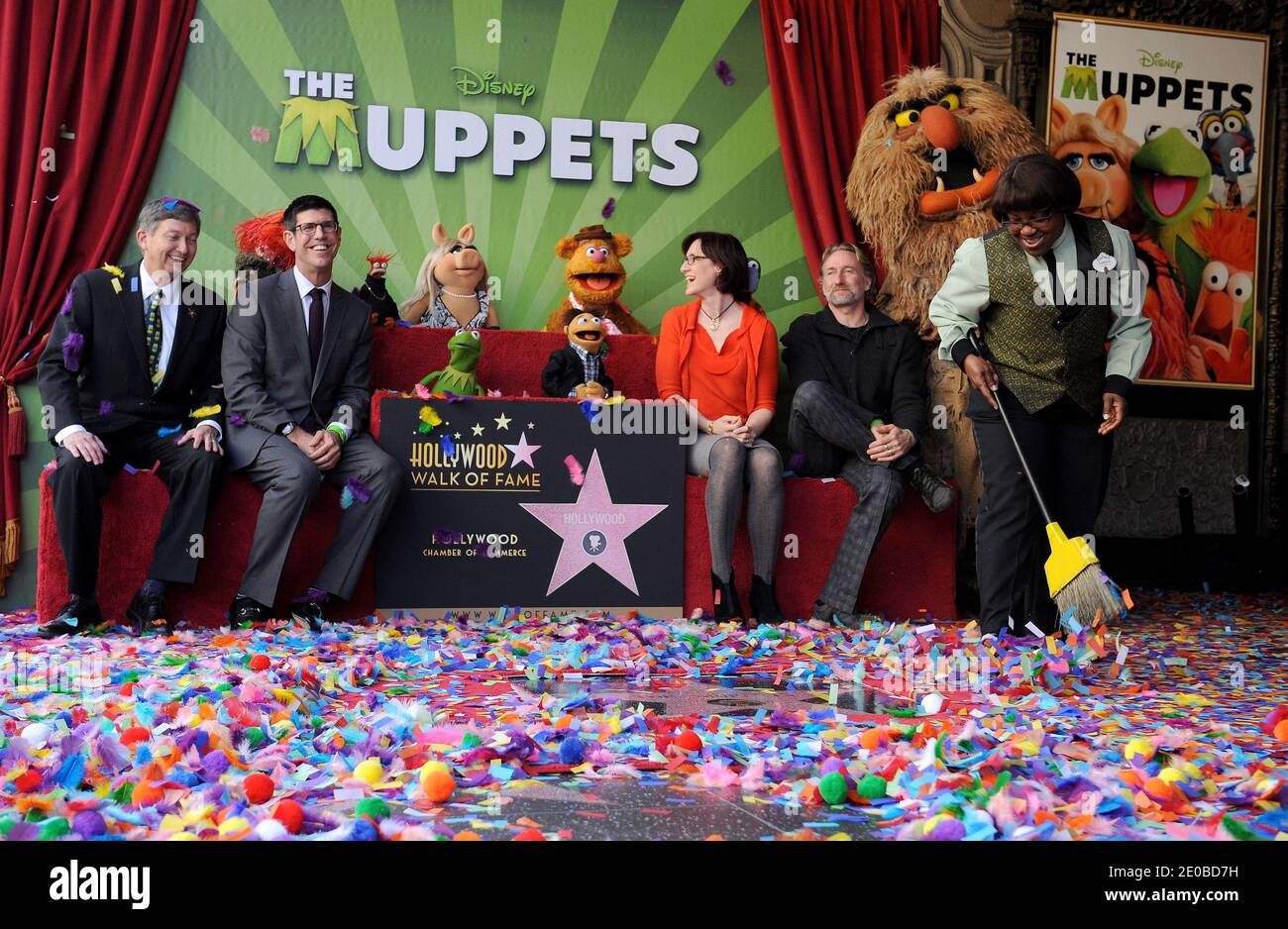 Leron Gubler, Rich Ross and Lisa Henson pose during the ceremony where ...