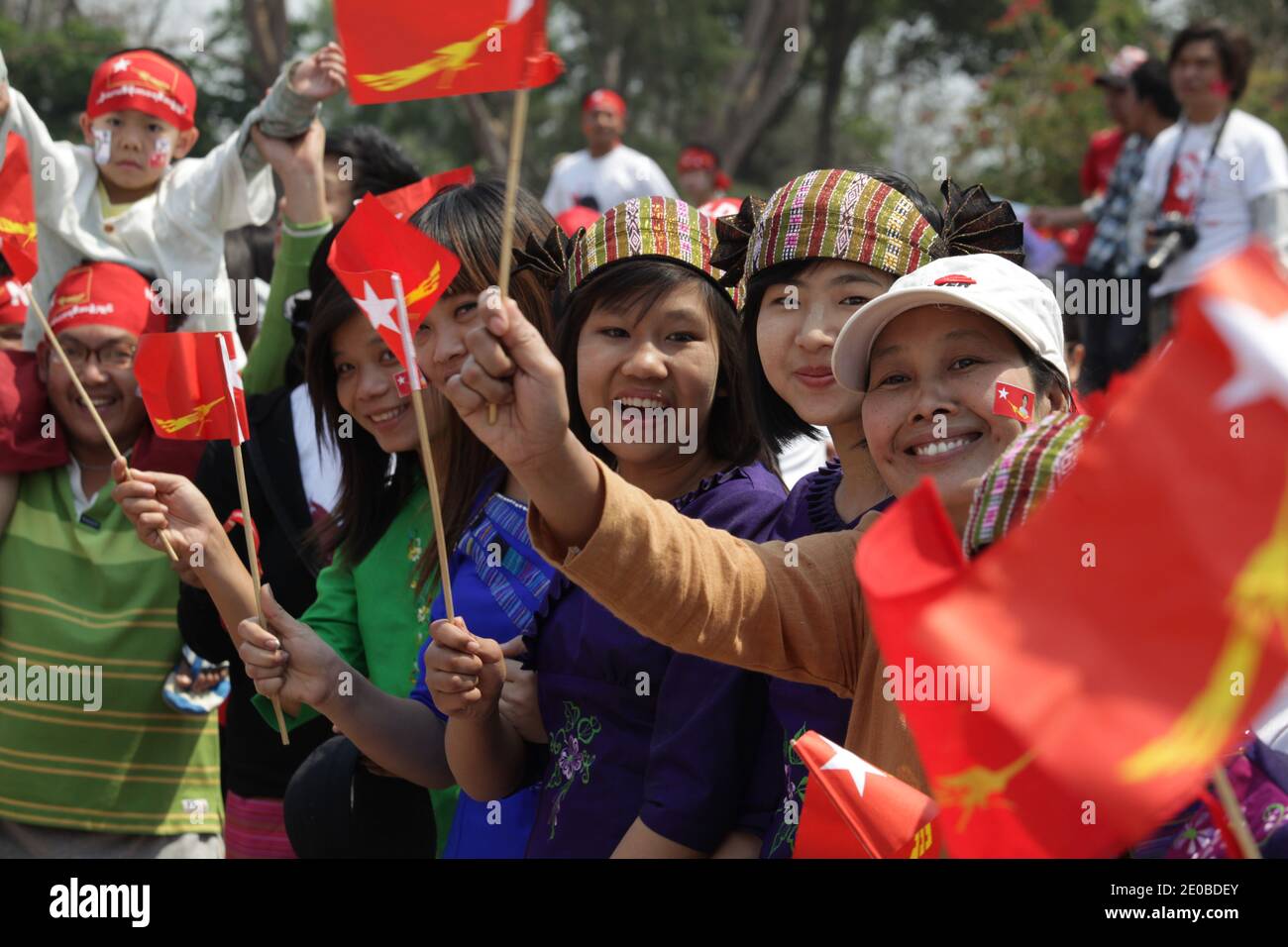 Young girls in traditional Shan costume are seen among thousands of ...