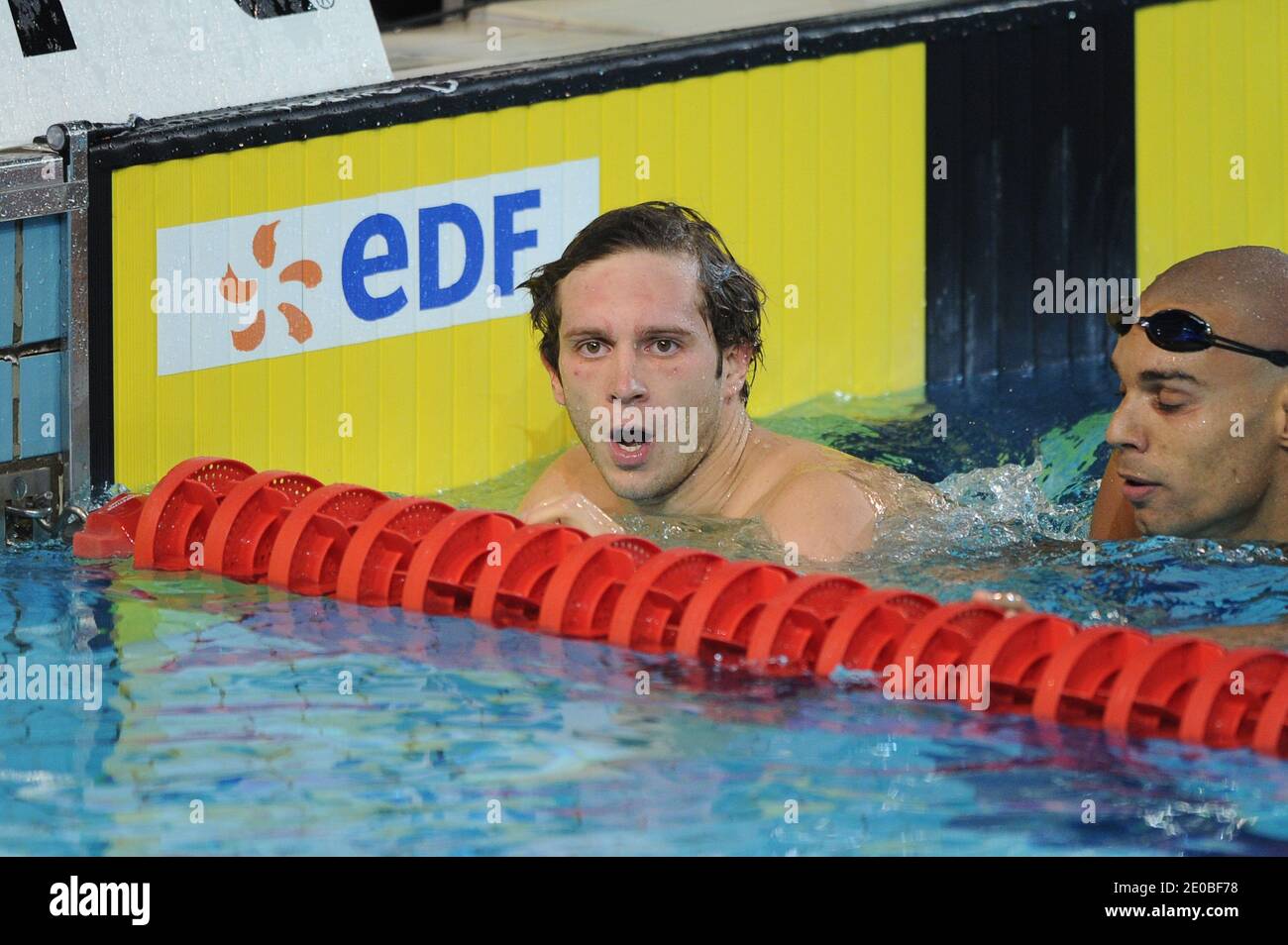 Clement Lefert competes on men's 100 meters butterfly semi final during ...