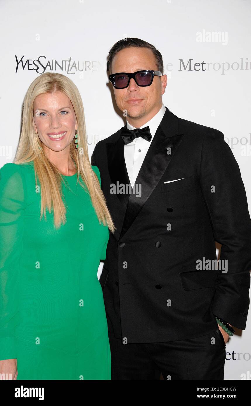 President of Yves Saint Laurent North America Brant Cryder and Mary ...