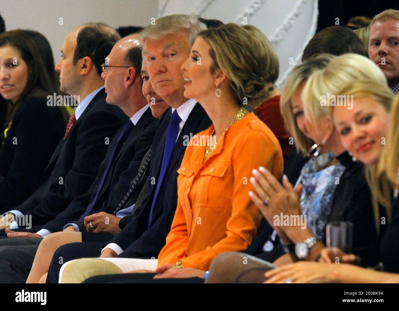 Donald Trump and Ivanka Trump sit in the front row during the Ivanka ...